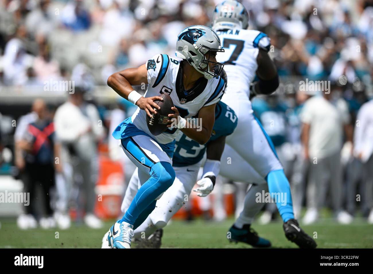 Carolina Panthers quarterback Bryce Young (9) scrambles away from ...