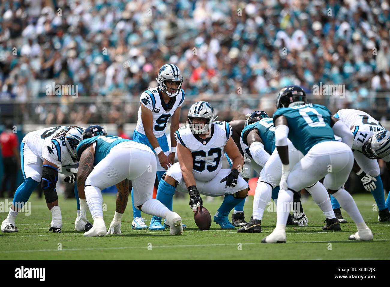 Carolina Panthers center Austin Corbett (63) and quarterback Bryce ...