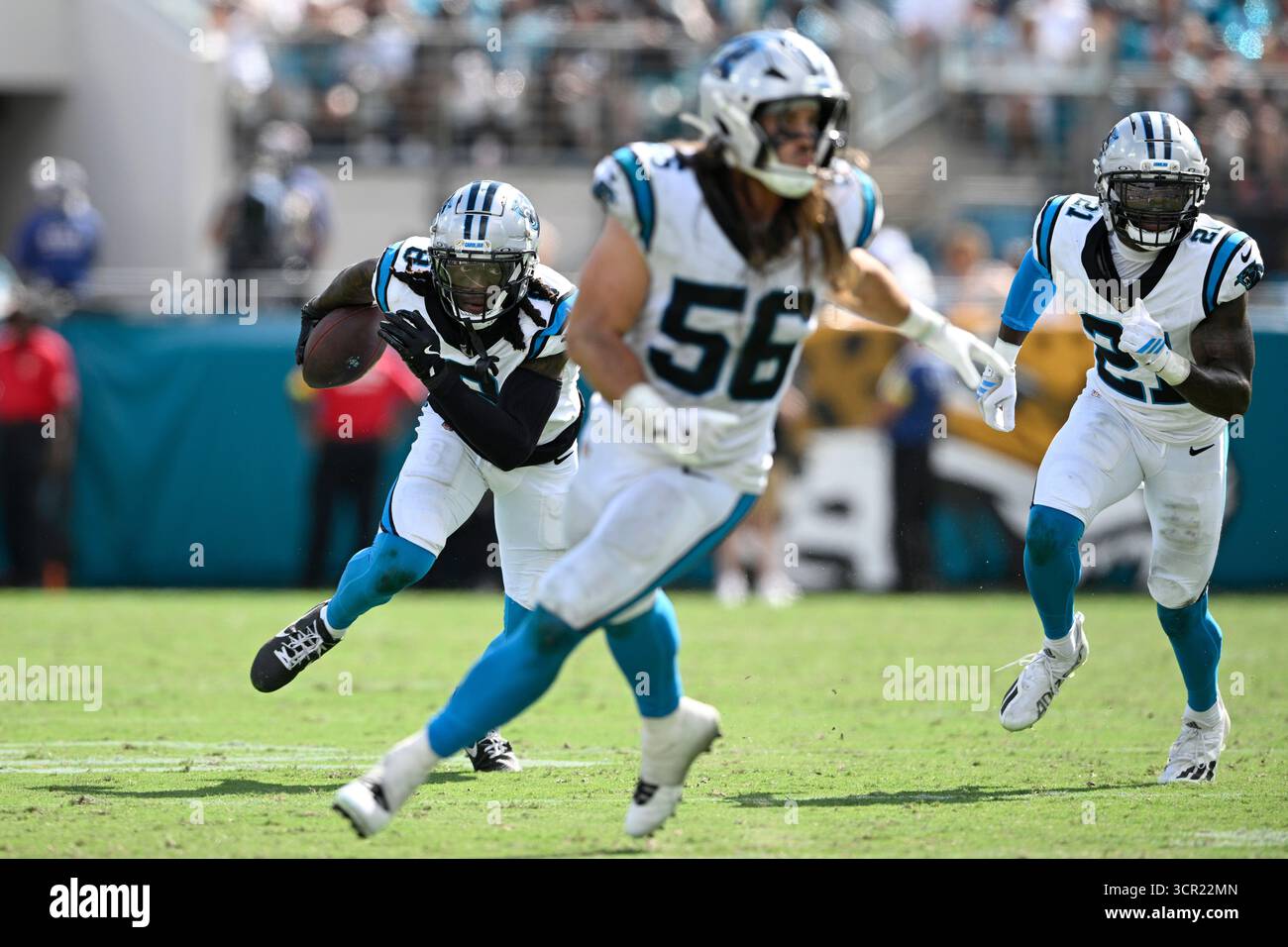 Carolina Panthers cornerback Jaycee Horn (8) runs after intercepting a ...