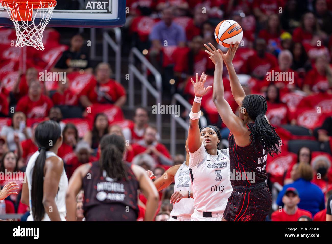 Las Vegas Aces forward NaLyssa Smith (3) defends a shot taken by Indiana Fever forward Aliyah ...