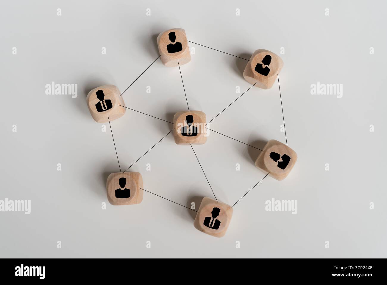 Corporate communication and teamwork concept with wooden cubes ...