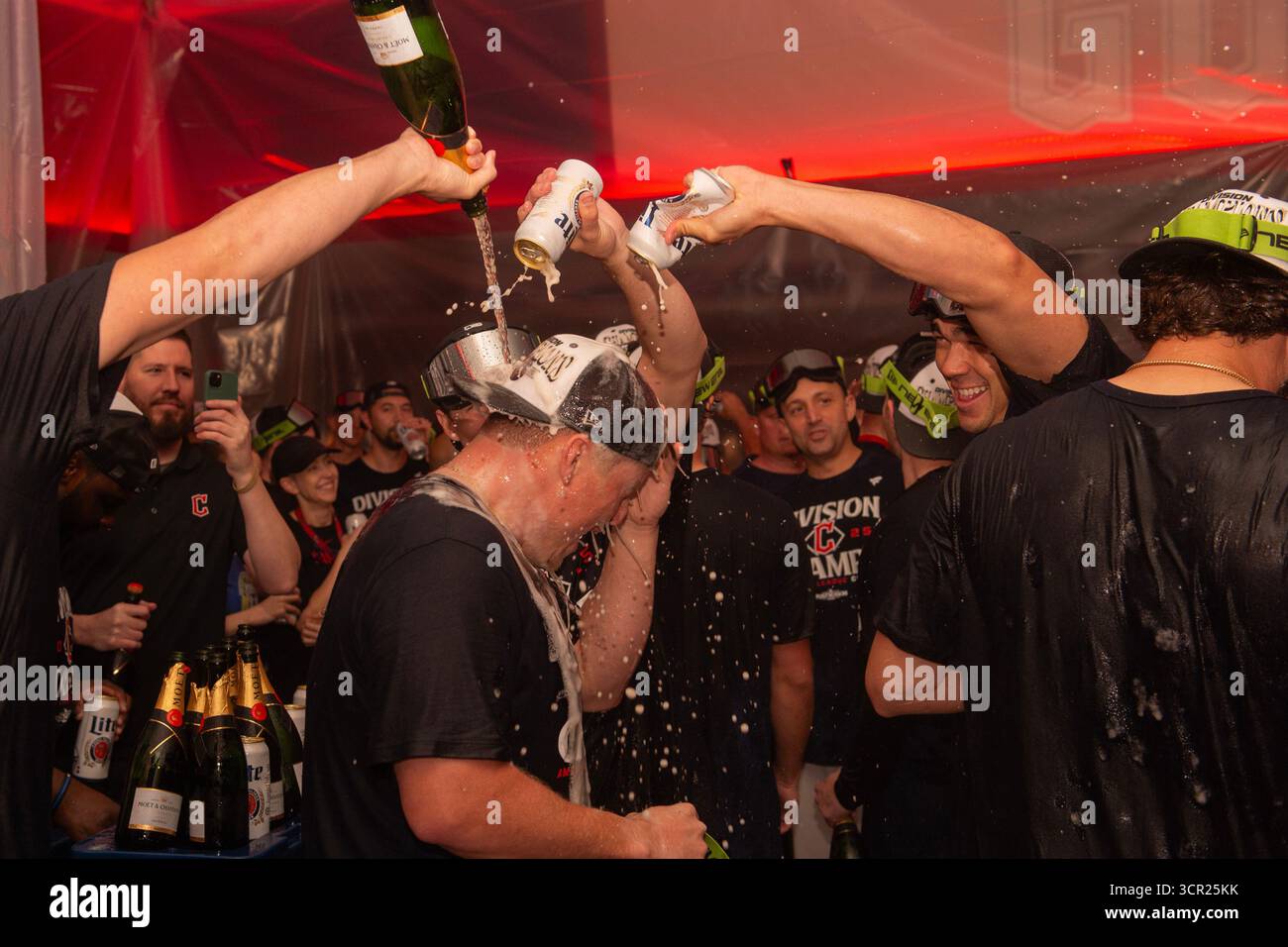 Cleveland Guardians relief pitcher Zak Kent is doused by teammates ...