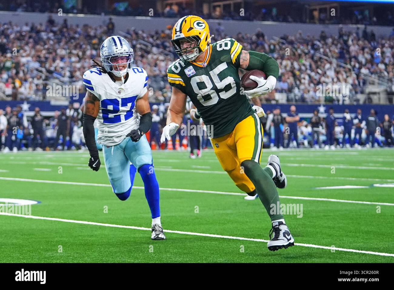 Green Bay Packers tight end Tucker Kraft (85) gains yards after a catch ...