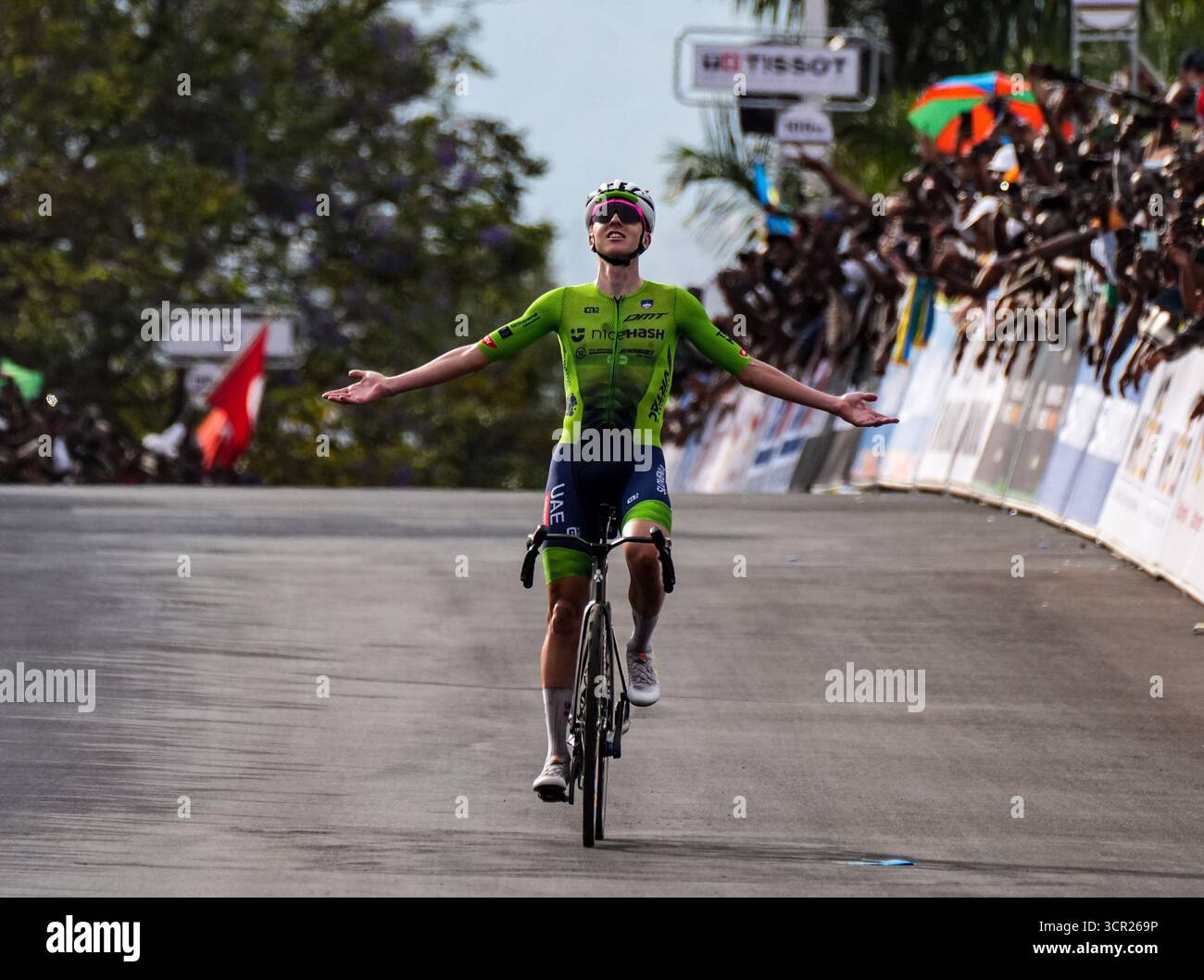Kigali, Rwanda. 28th Sep, 2025. Tadej Pogacar of Slovenia celebrates ...