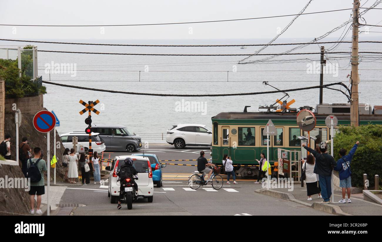 A photo shows a railroad crossing associated with the Japanese ...