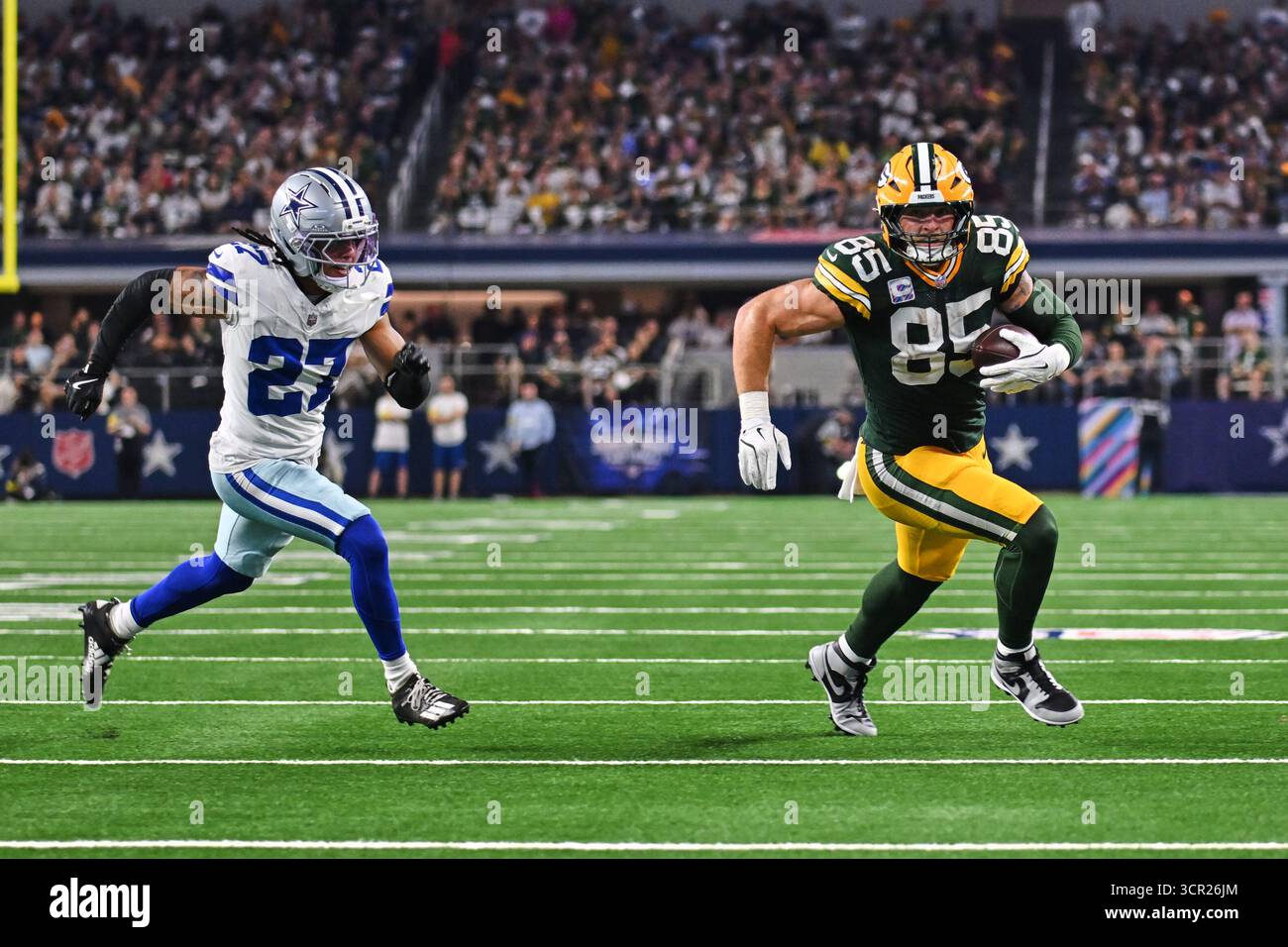 Green Bay Packers tight end Tucker Kraft (85) gains yards after a catch ...