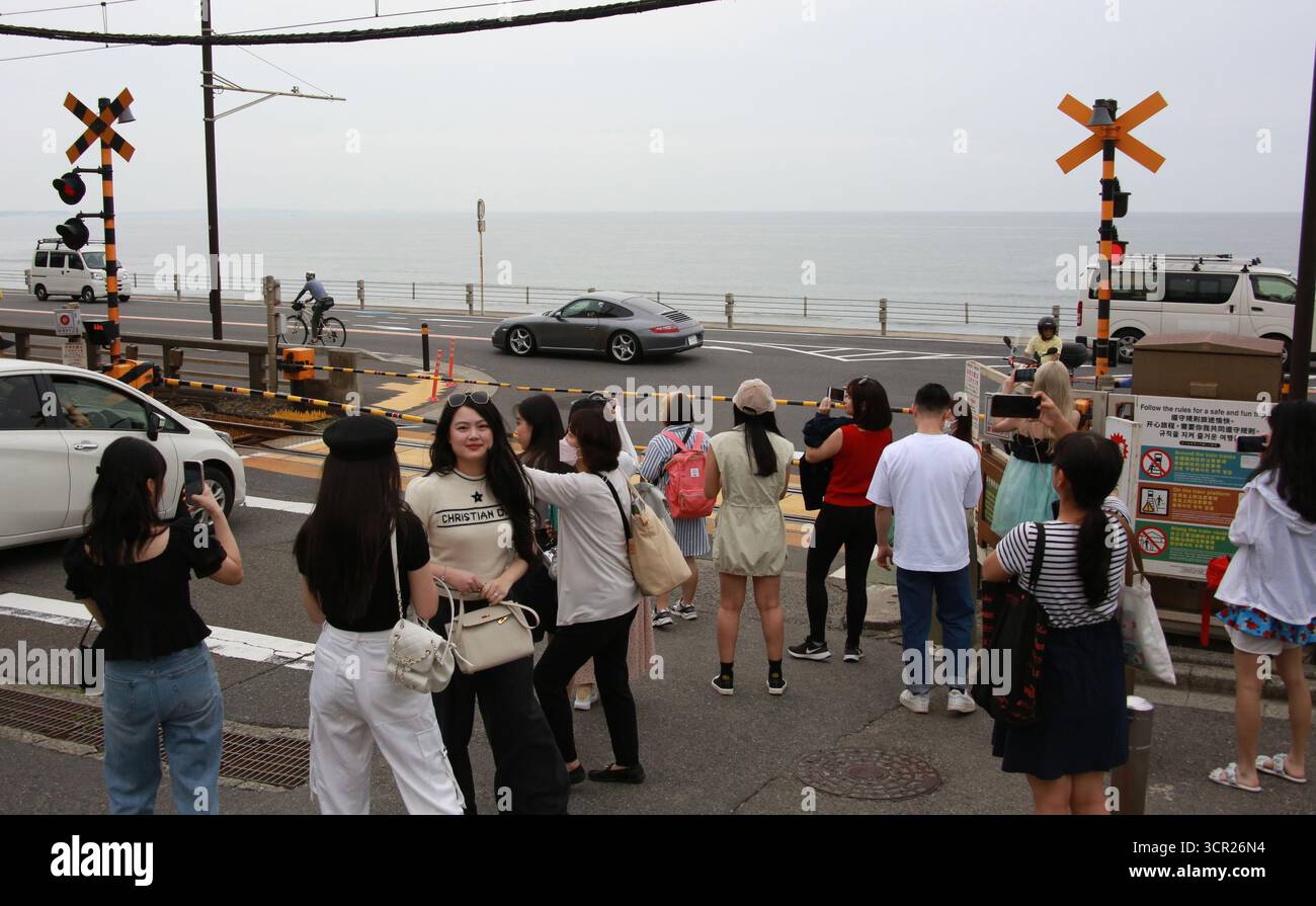 A photo shows a railroad crossing associated with the Japanese ...