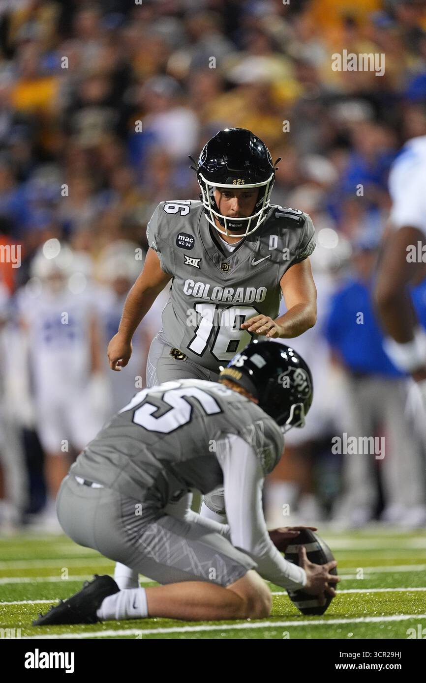 Colorado punter Damon Greaves (35) sets the ball for Colorado place ...