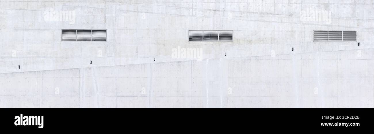 external concrete wall of the building with lattices of ventilation and ...