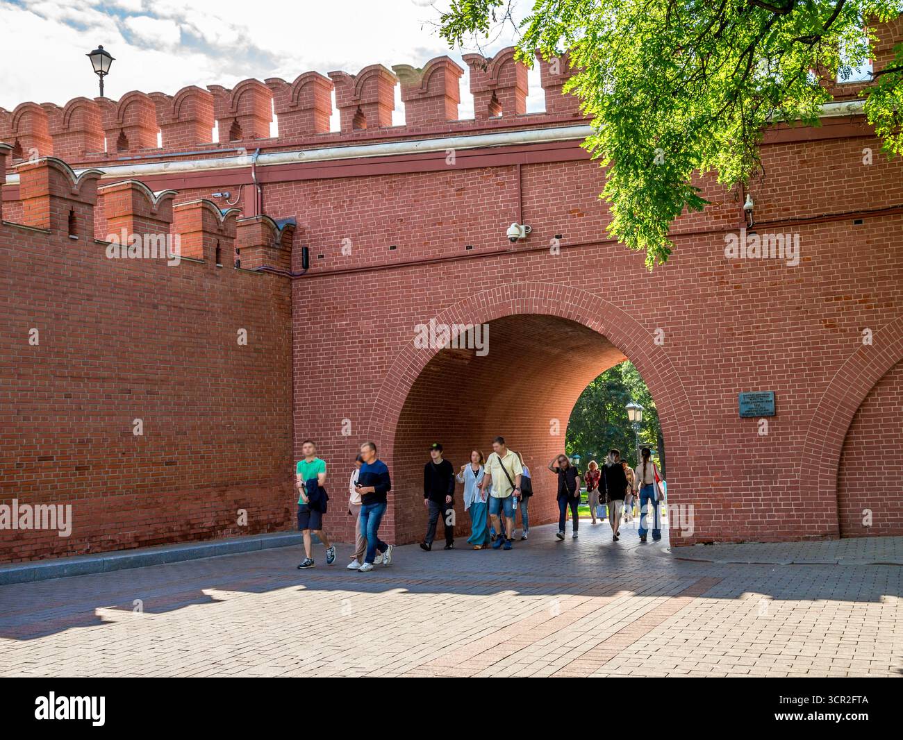 Visitors Walk Through Kremlin Red Brick Arch Gate in Alexander Garden ...