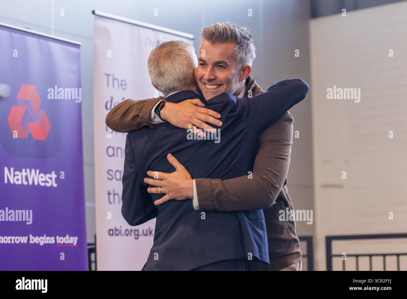 Liverpool, UK. 28 SEP, 2025. Sadiq Khan, Mayor of London embraces David ...