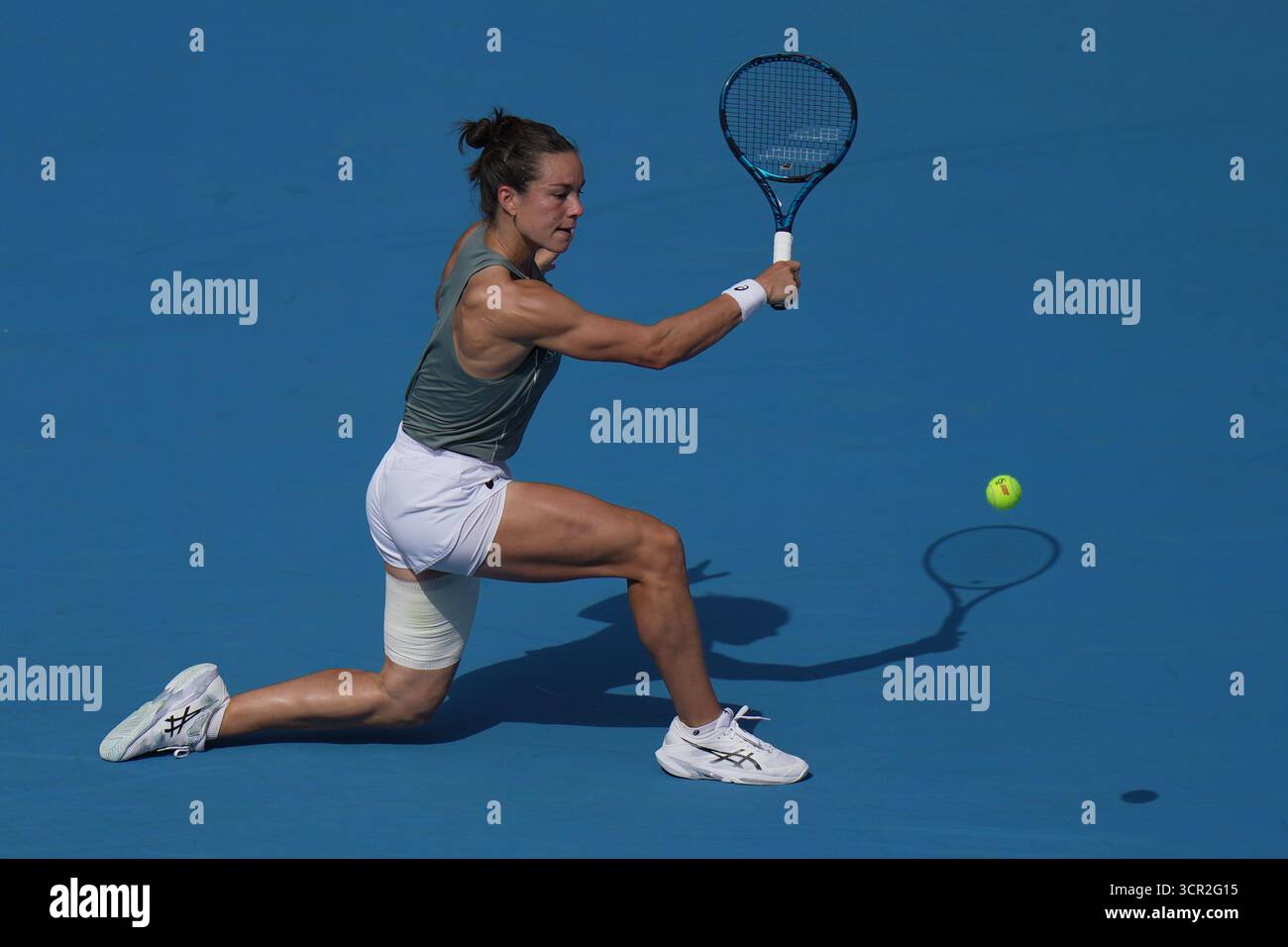 Lois Boisson, of France plays a backhand return to Emma Navarro, of the ...