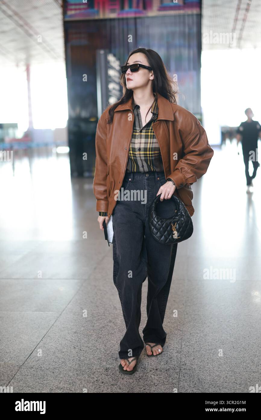 Chinese actress and singer Song Jia appears at the airport in Beijing ...
