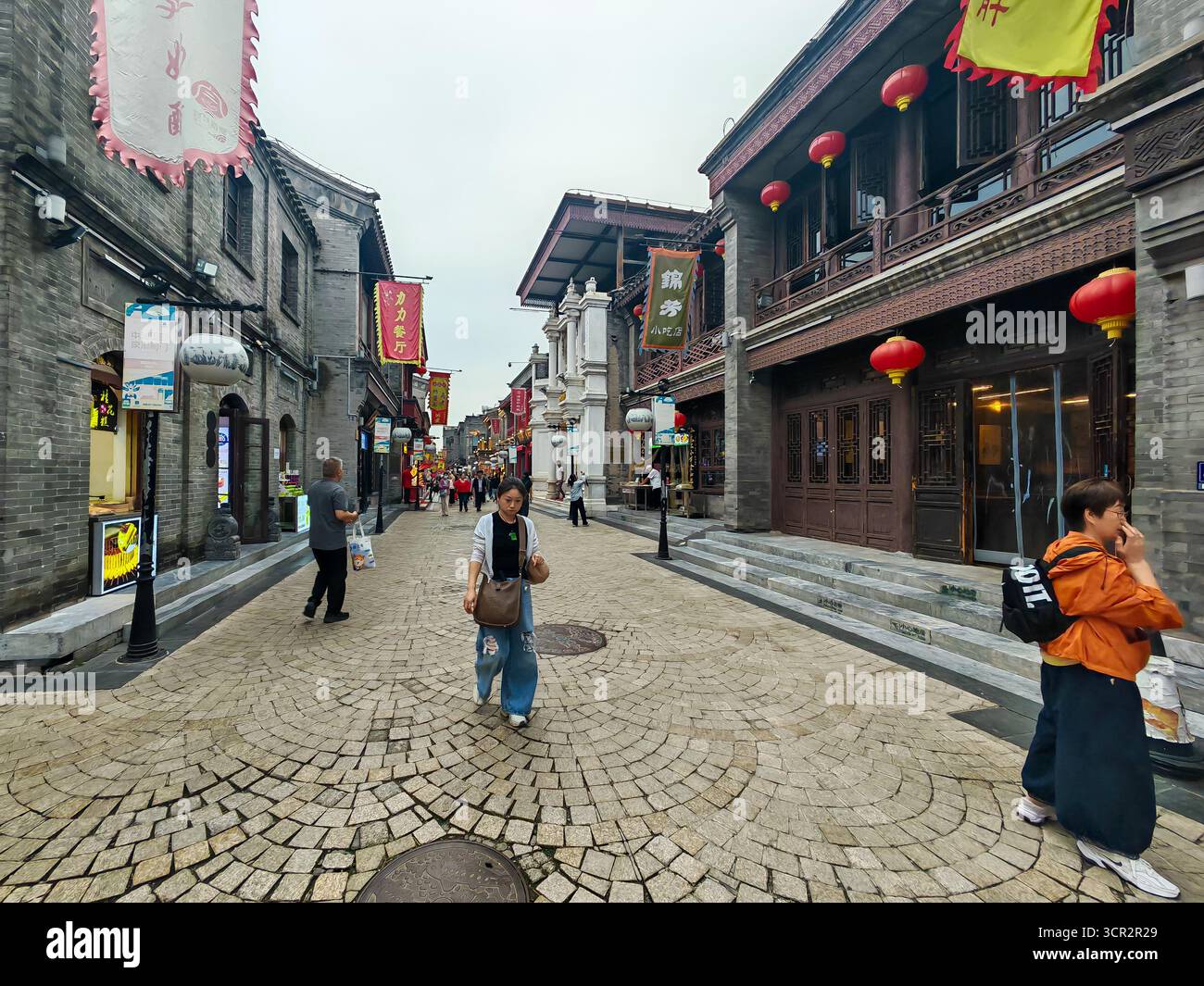Beijing, China - September 15, 2025 : Pedestrians stroll along Qianmen ...