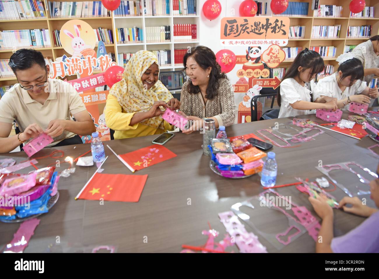 People take part in activities to welcome the Mid-Autumn festival in ...