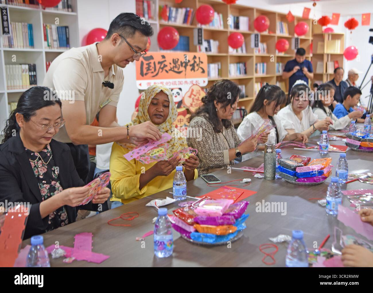 People take part in activities to welcome the Mid-Autumn festival in ...