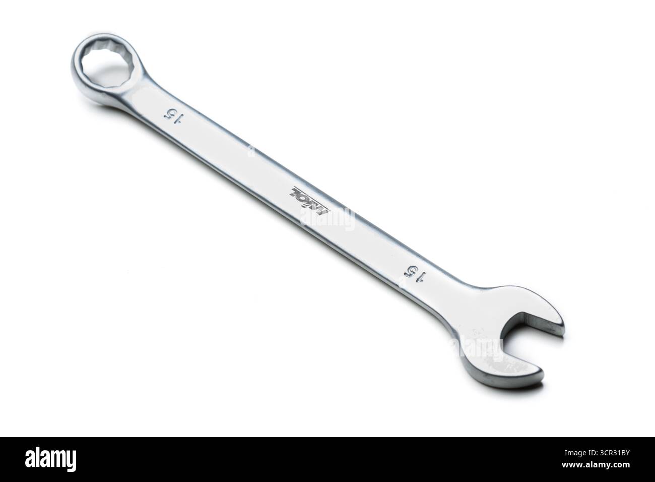Wrench resting on a surface indicating precision engineering tools for ...