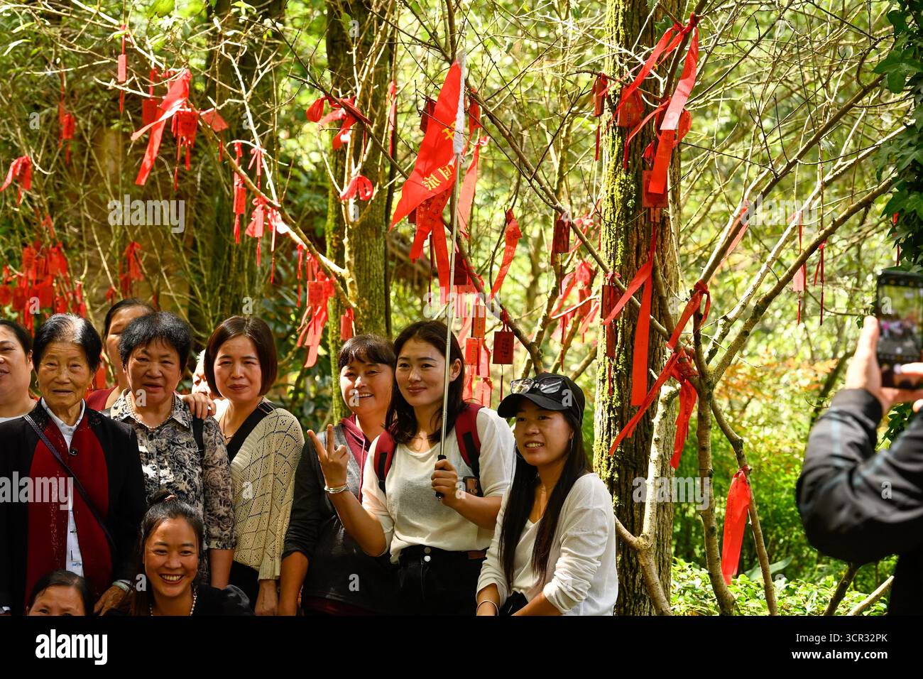 Tourists visit the Taohuayuan scenic area in Youyang County, Chongqing ...
