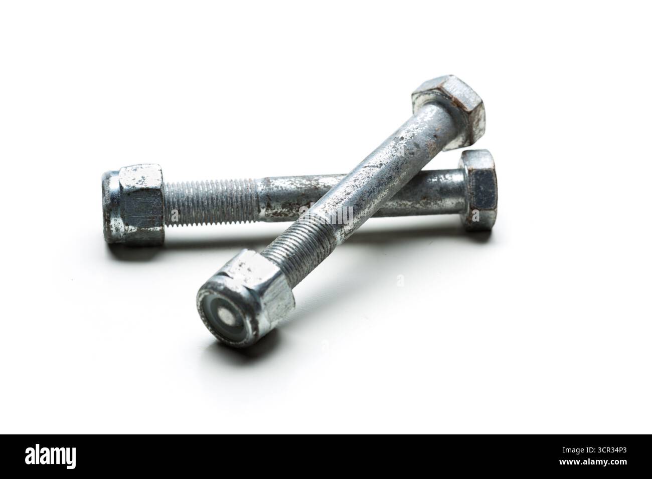 Metal bolts arranged on a surface showcasing their design and texture ...