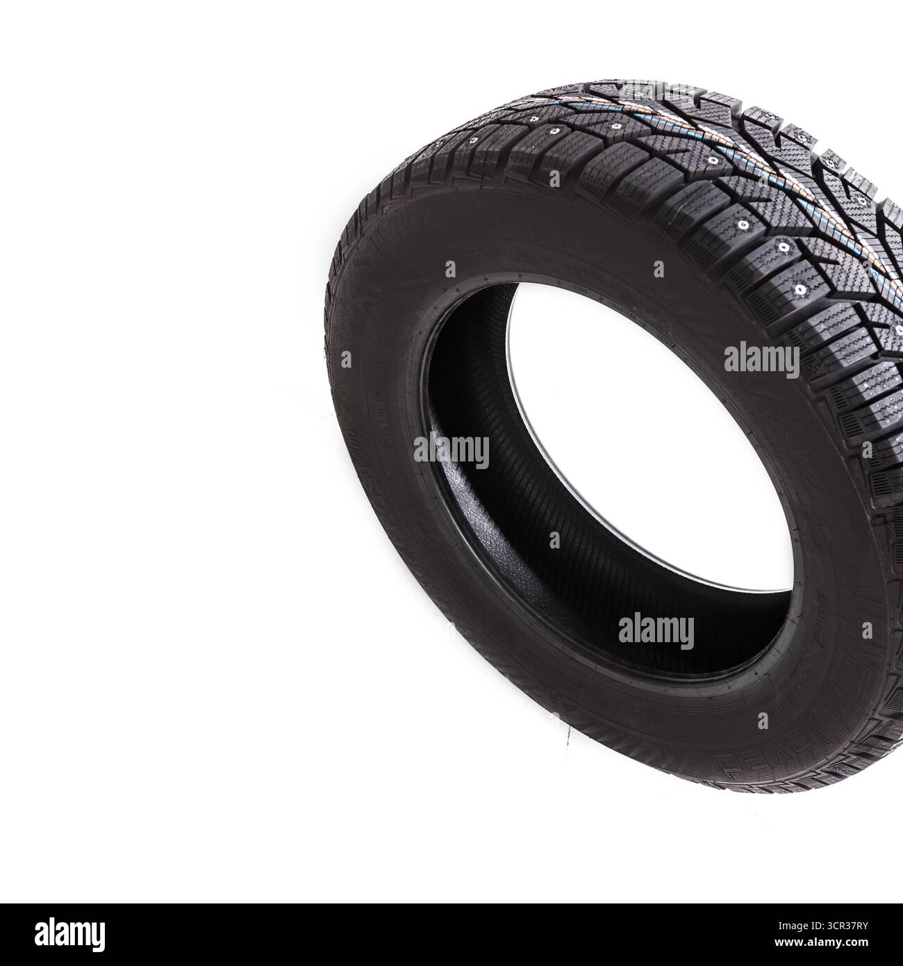 Winter tire designed for enhanced grip and safety on snowy roads during ...