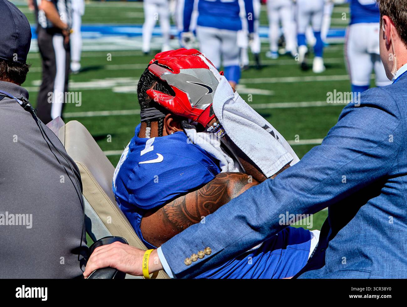 New York Giants wide receiver Malik Nabers (1) is carted off the field ...