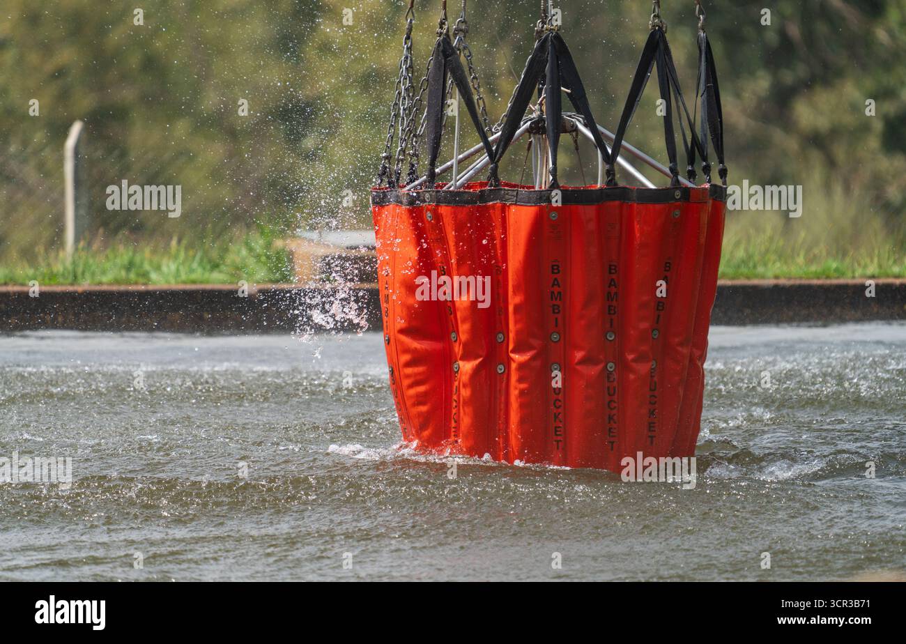 Aerial Firefighting: Bambi Bucket in Action Stock Photo - Alamy