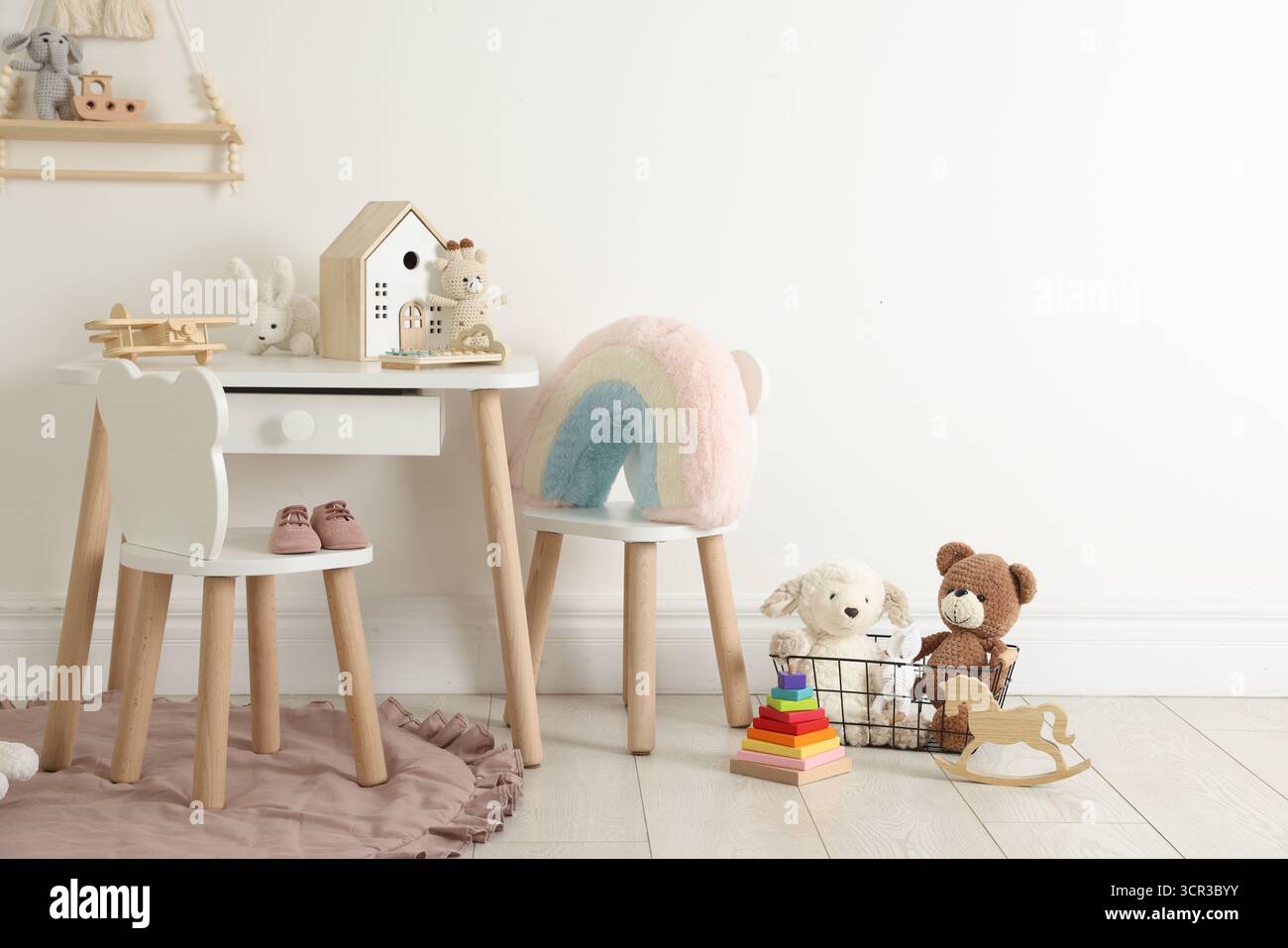 Different cute toys and furniture in child's room. Space for text Stock ...