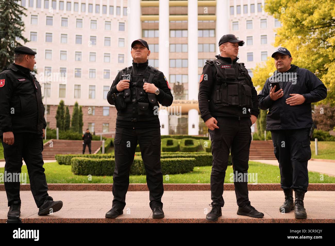 Police officers guard the Parliament building prior to a protest of the ...