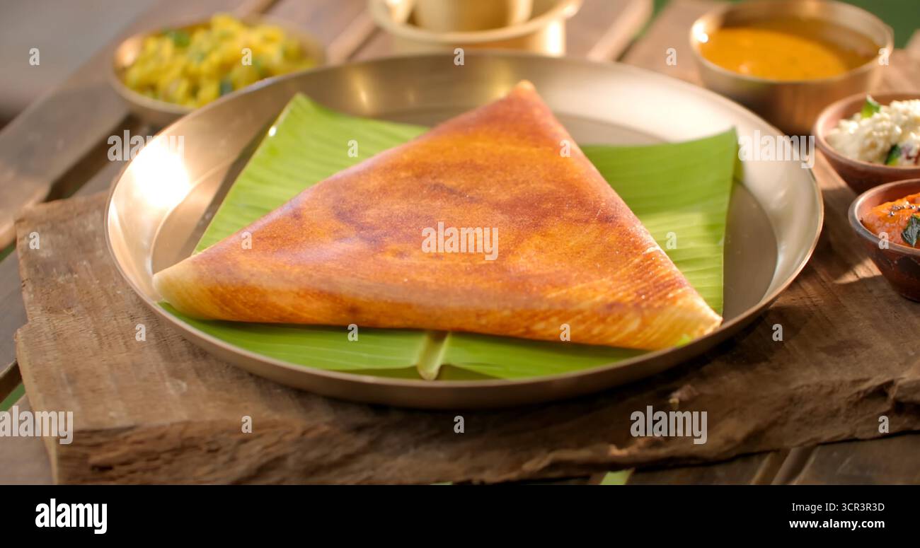 Masala dosa, Mysore dosa, Rava dosa, and Paper dosa served hot with ...