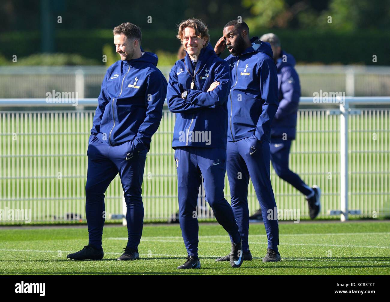 Tottenham Hotspur's Matt Wells, manager Thomas Frank, and Justin ...