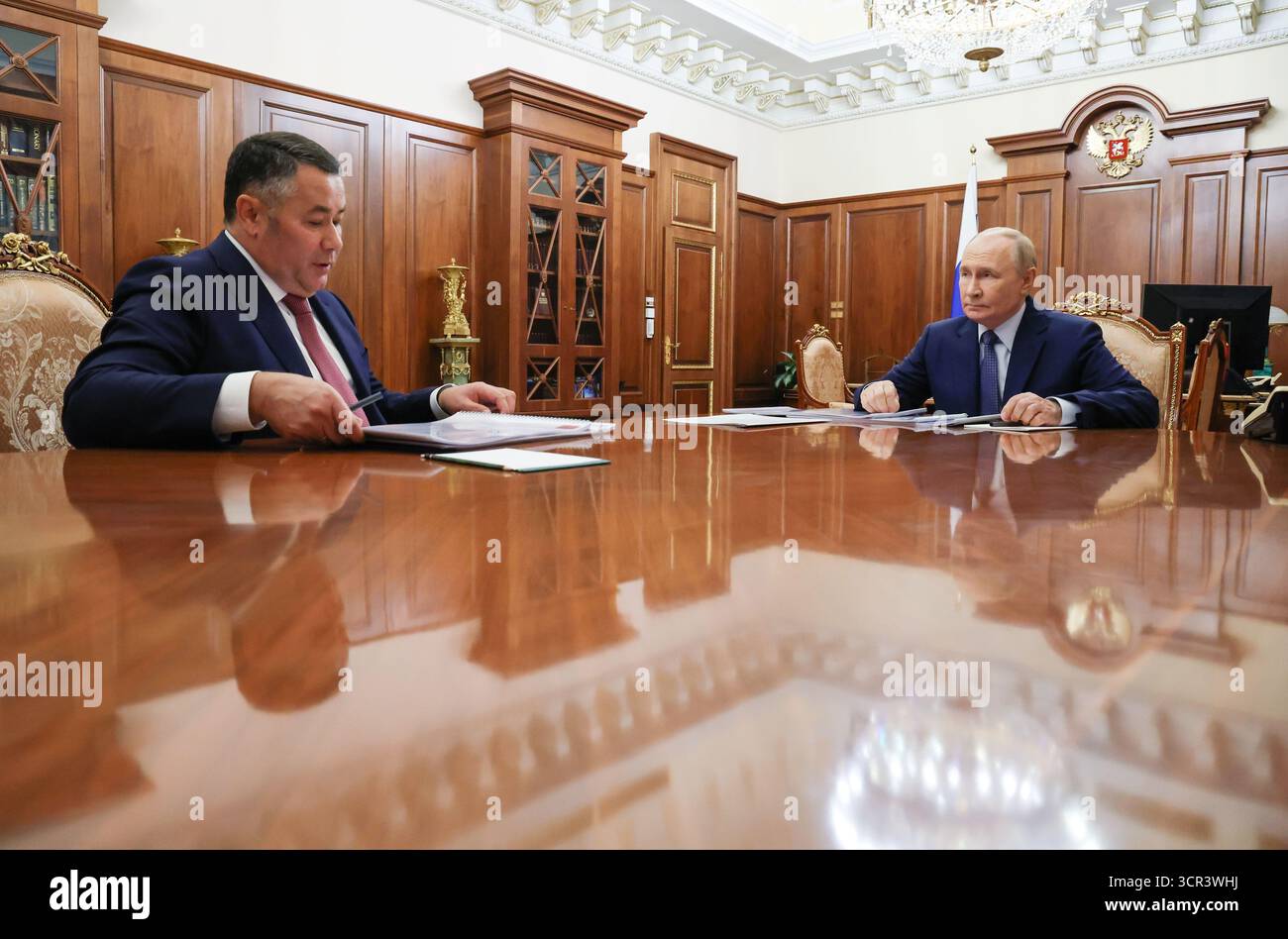 Russian President Vladimir Putin, right, meets with Tver Region ...