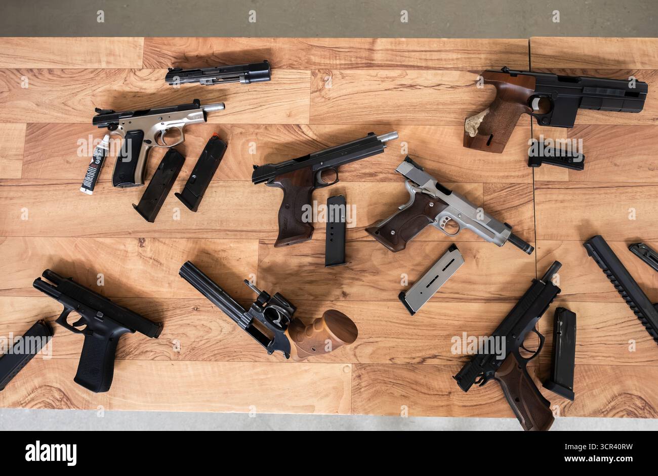 Germany. 19th Sep, 2025. Various semi-automatic handguns, revolvers and ...