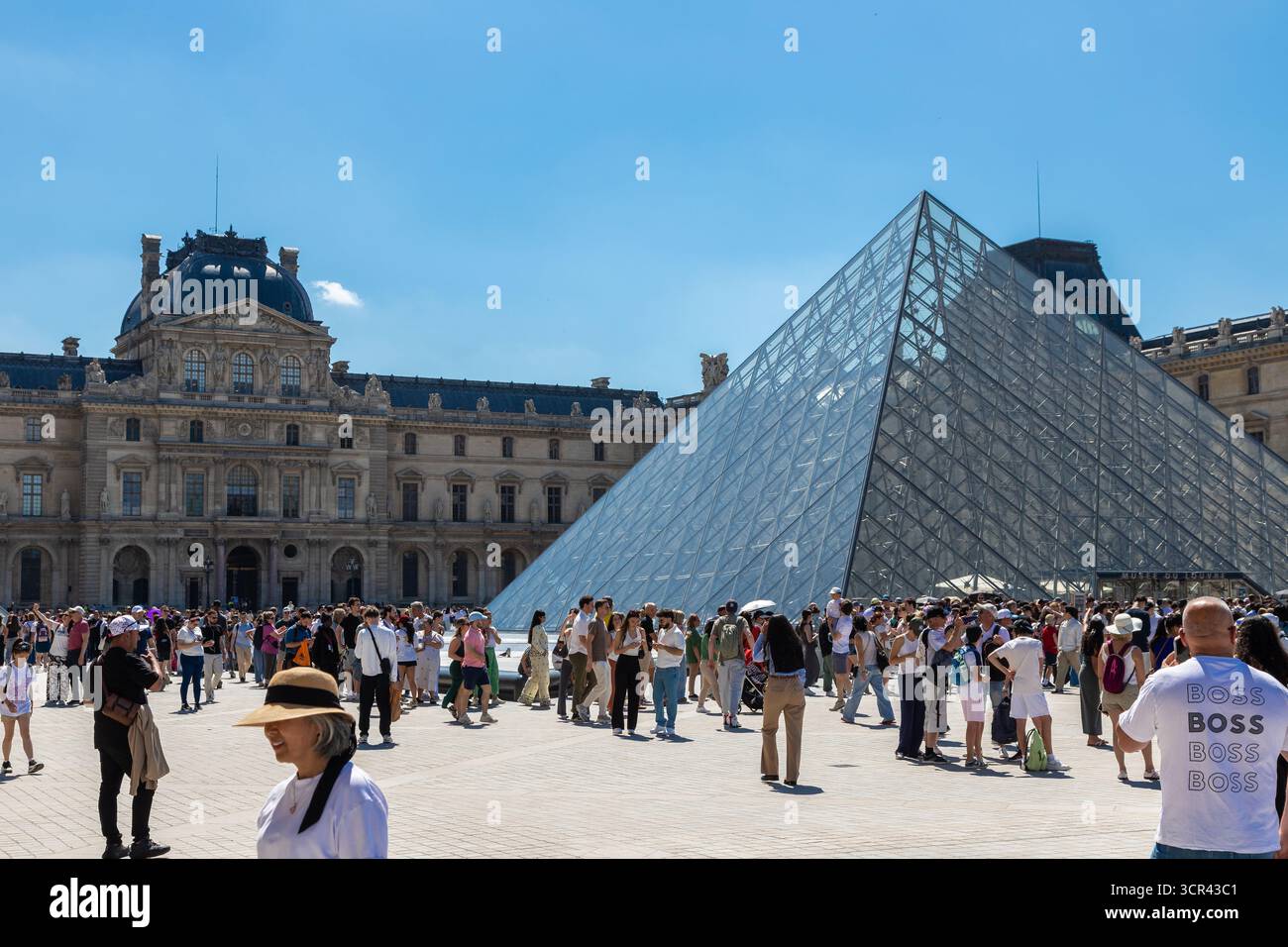 Louvre Museum with is iconic glass pyramid, is a national art museum in ...