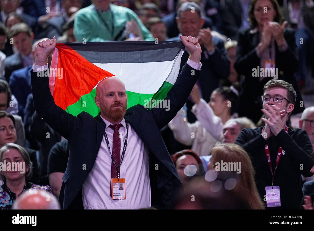 A pro-Palestinian protester interrupts Chancellor of the Exchequer ...