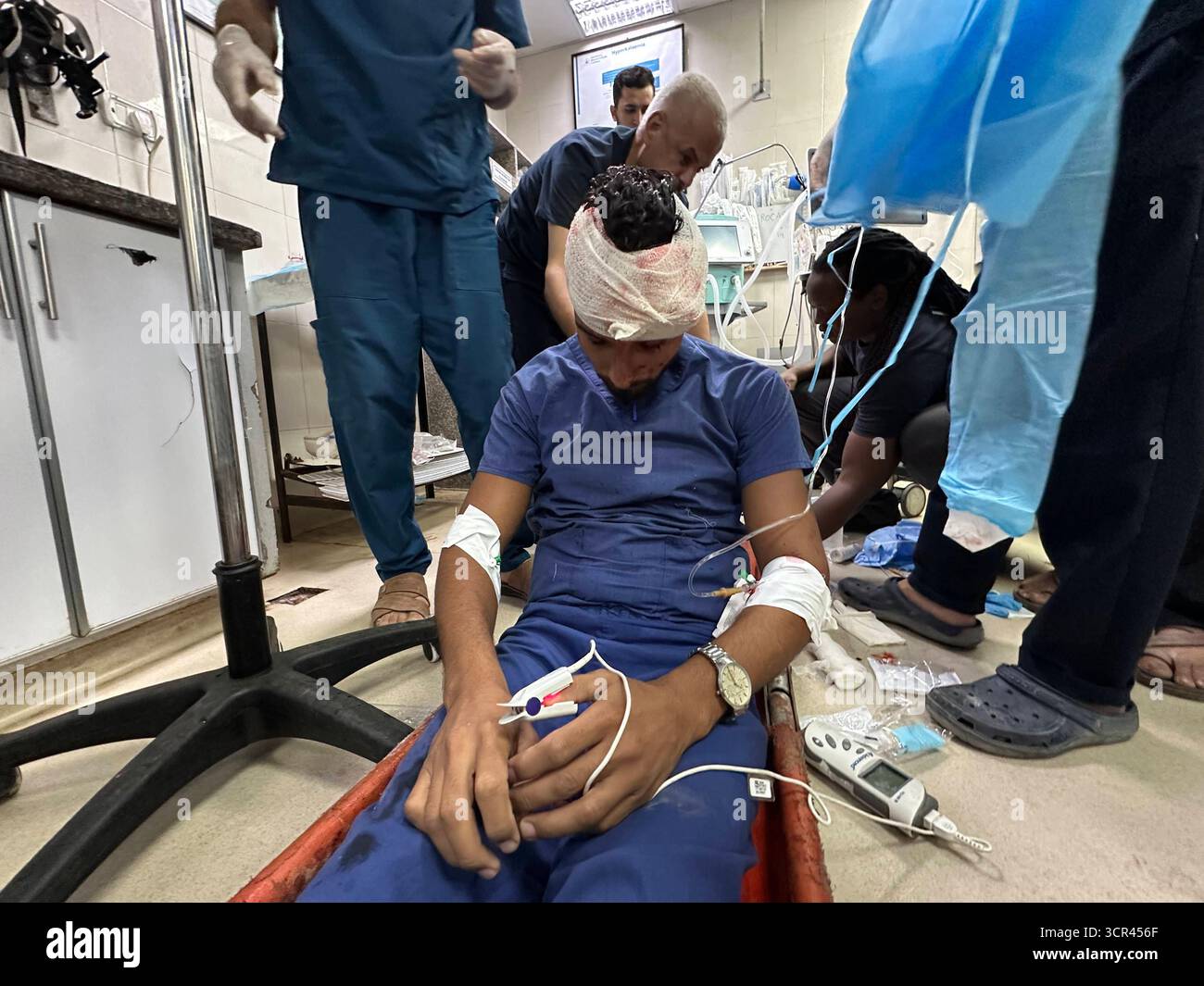 A Palestinian nurse is treated at the emergency department after being ...