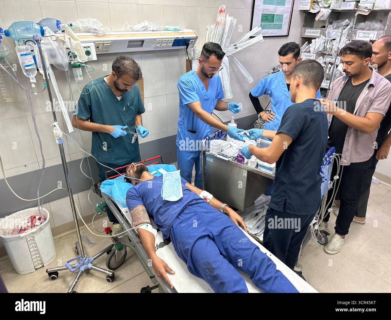 A Palestinian nurse is treated at the emergency department after being ...