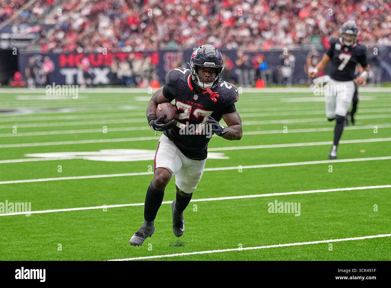 Houston Texans running back Woody Marks (27) rushes for a touchdown ...