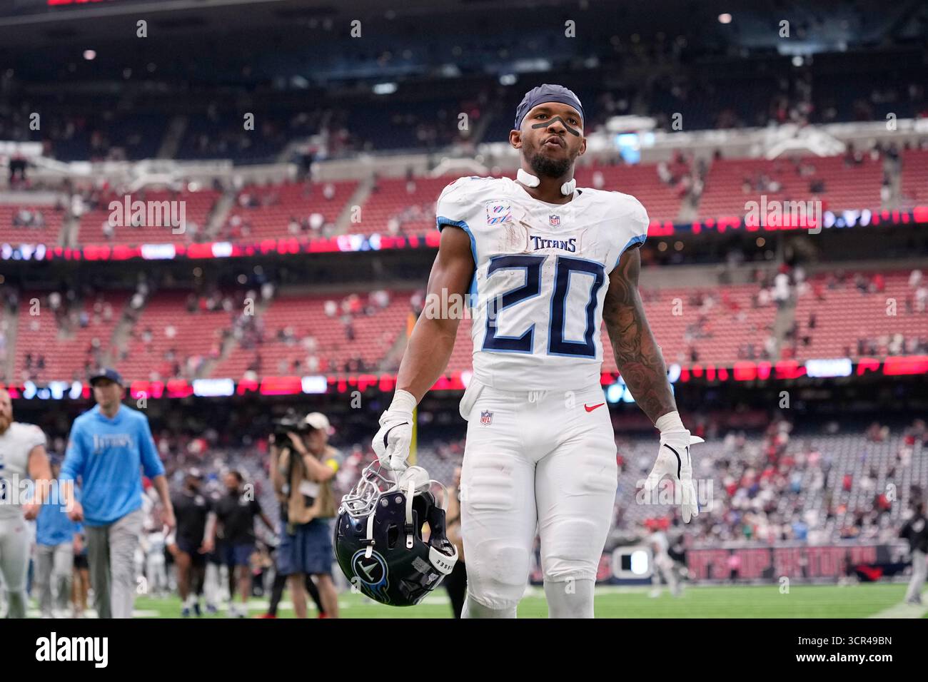 Tennessee Titans running back Tony Pollard (20) leaves the field after ...