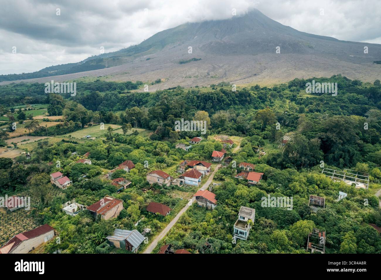 Aerial view of the ghost town of Berastepu, located near Mount Sinabung ...