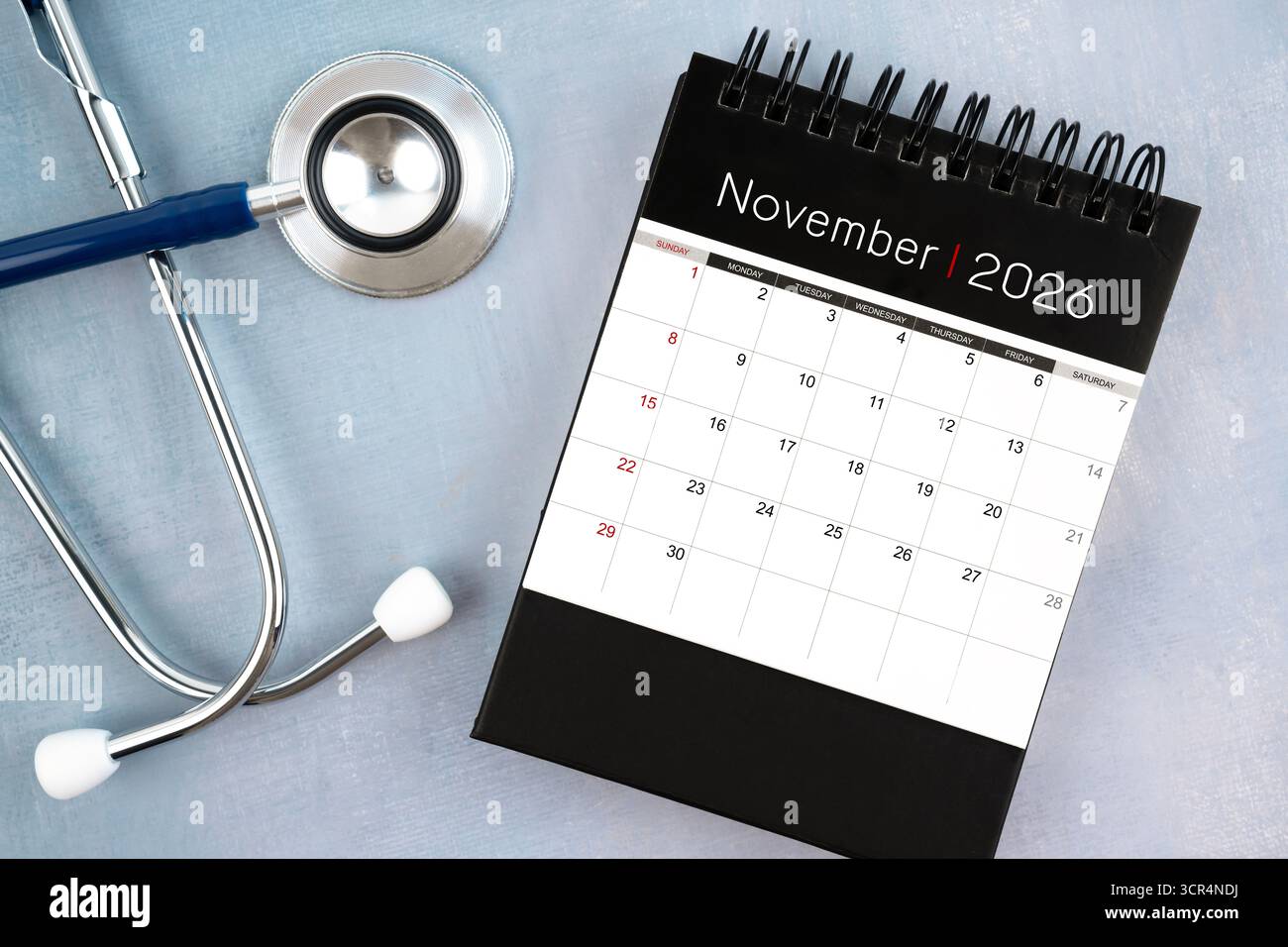 November 2026 desk calendar and stethoscope, Medical appointment ...