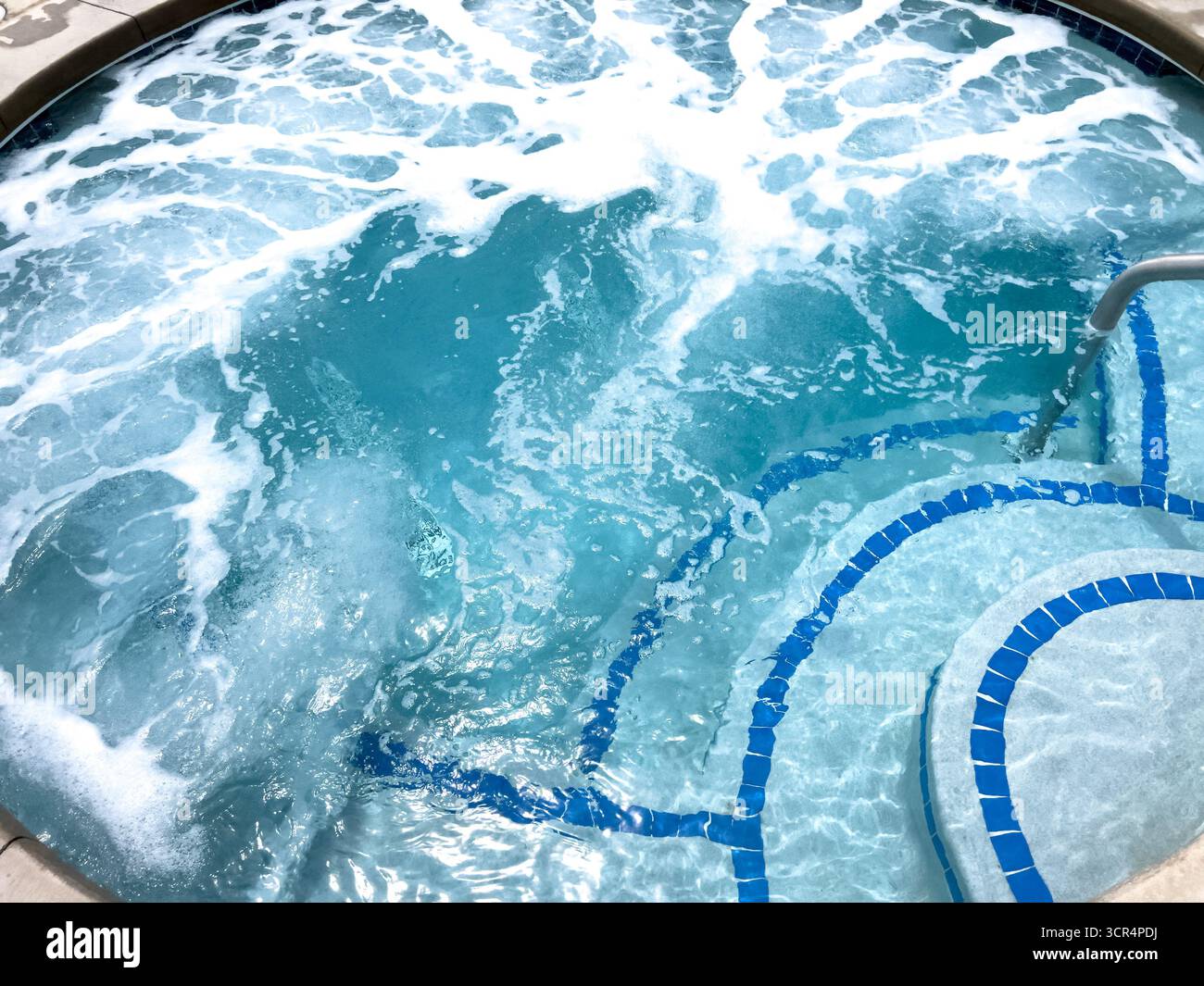 Top view of foamy water in outdoor hot tub Stock Photo - Alamy