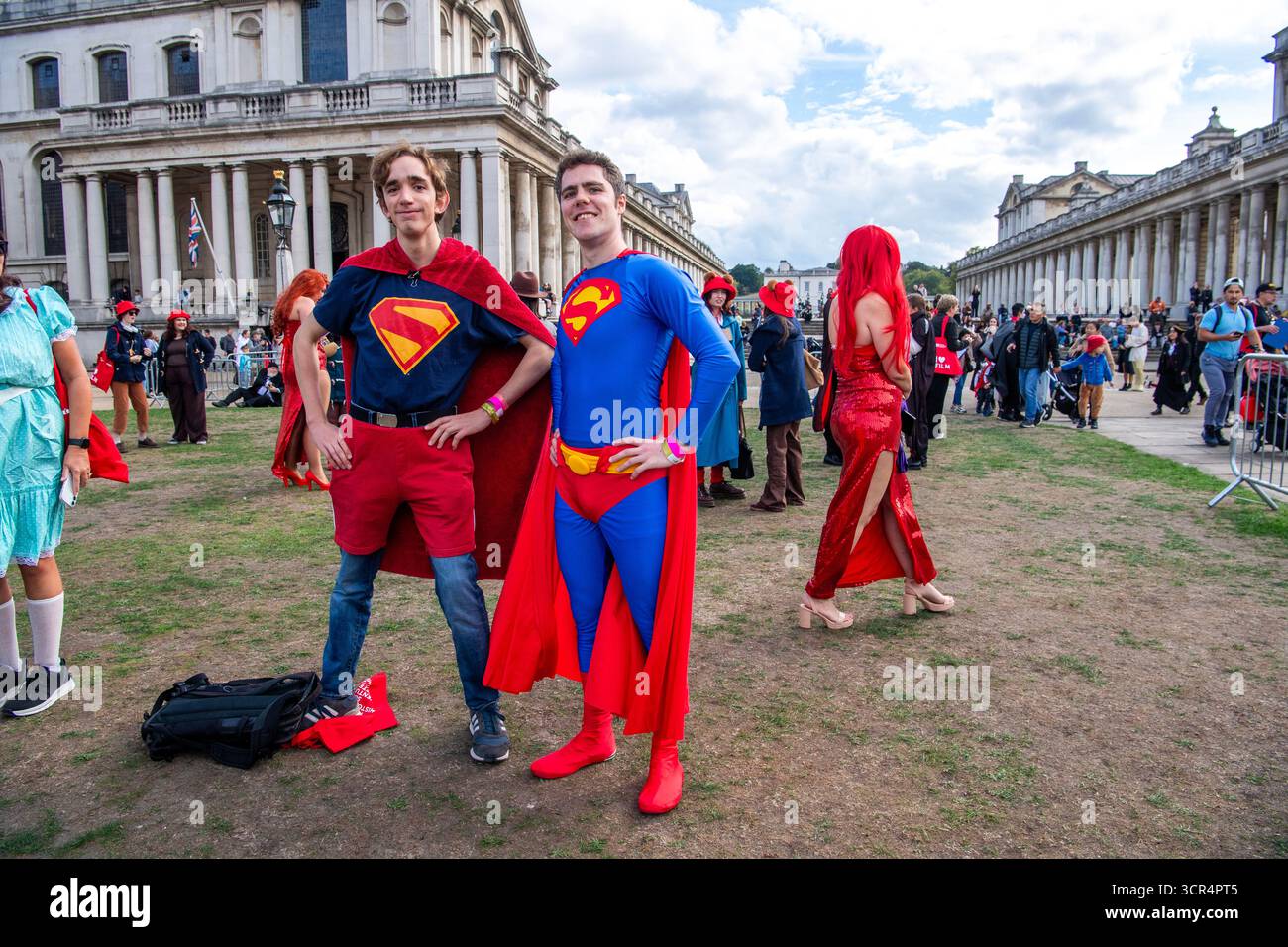 Crowds in costume gather at the Old Royal Naval College, setting a ...