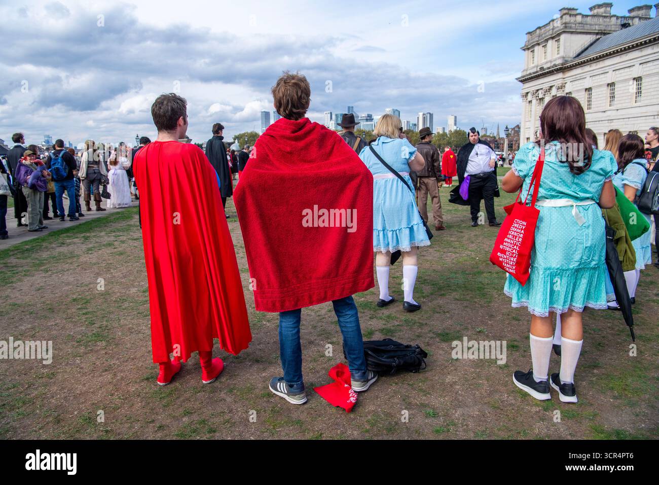 Crowds in costume gather at the Old Royal Naval College, setting a ...