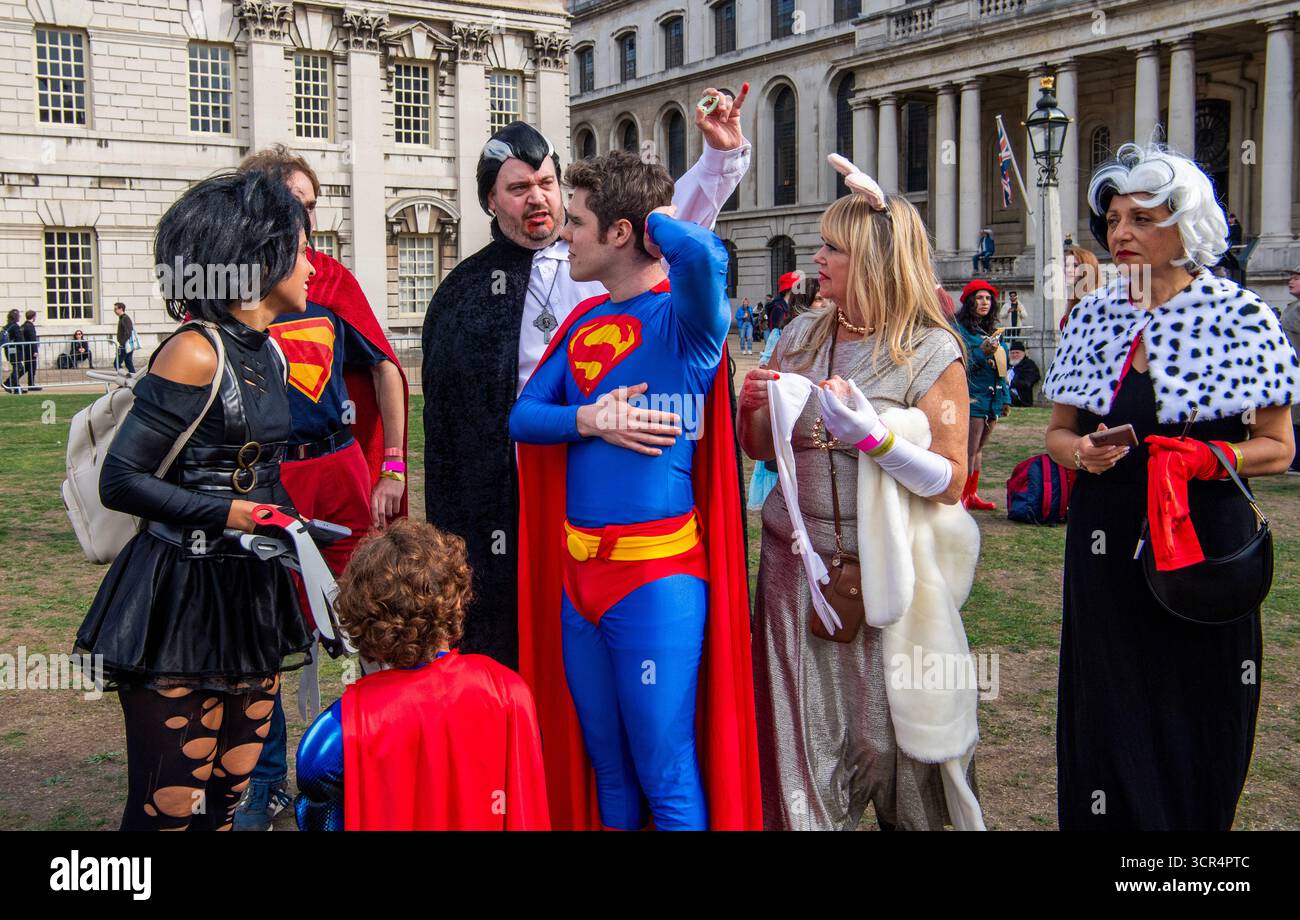 Crowds in costume gather at the Old Royal Naval College, setting a ...