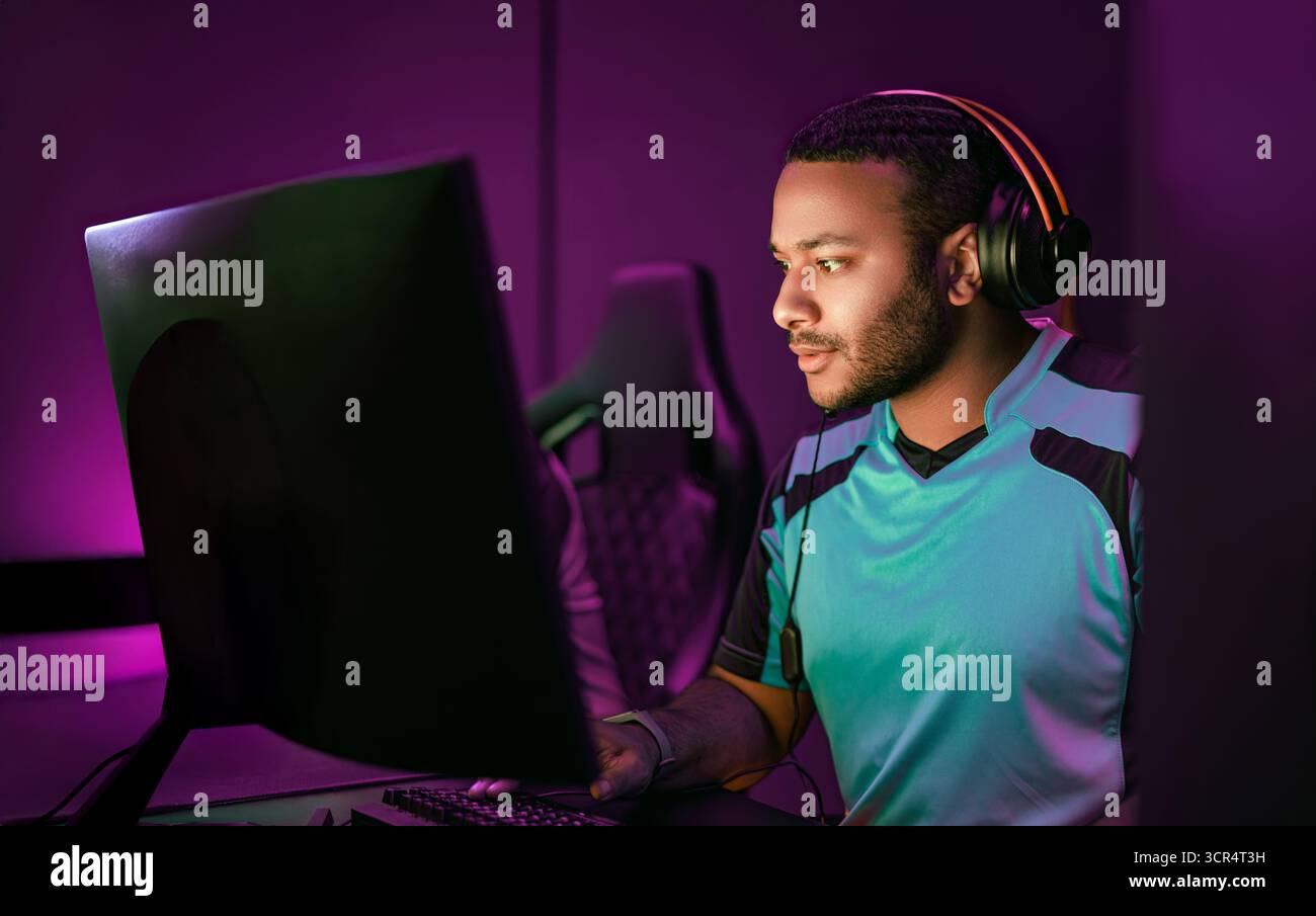 Professional gamer competing in intense hi-res stock photography and ...