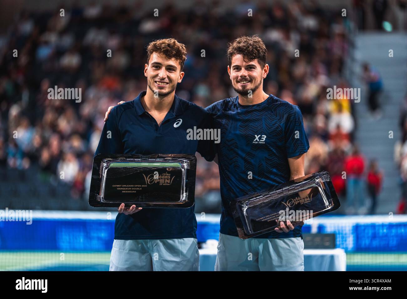 Clement Chidekh (FRA) and Luca Sanchez (FRA) posing with the trophy ...