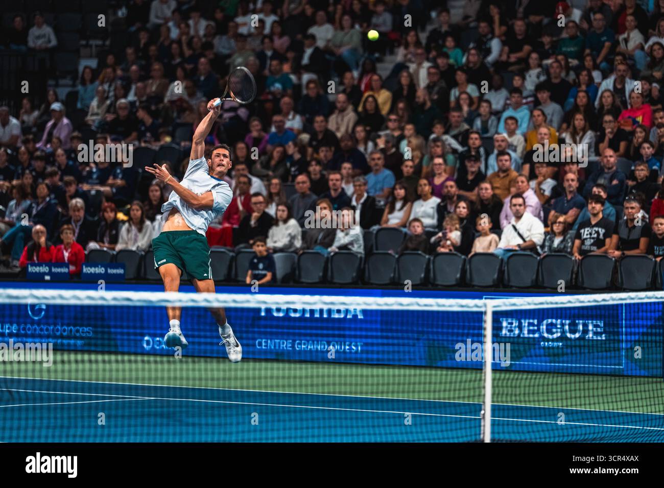 Josh Paris (GBR) smashes a winner during the doubles final of the CO ...