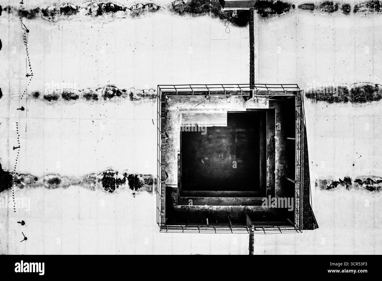 Opening in roof of abandoned industrial building Stock Photo - Alamy