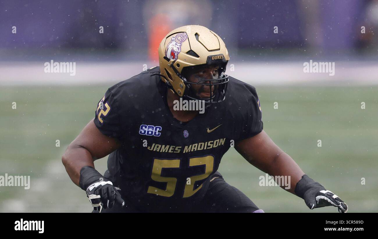 James Madison offensive lineman Carter Sweazie (52) during an NCAA ...