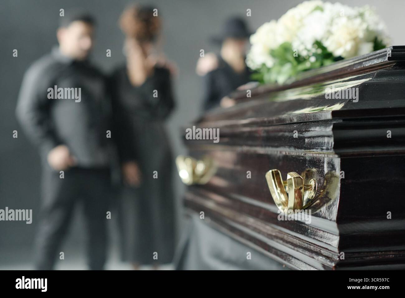 Multiethnic Group Mourning Beside Coffin during Funeral Ceremony ...